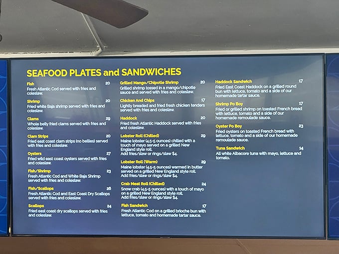 This menu board is like a treasure map for seafood lovers—X marks the spot for that legendary lobster roll, with plenty of other oceanic gems to discover.