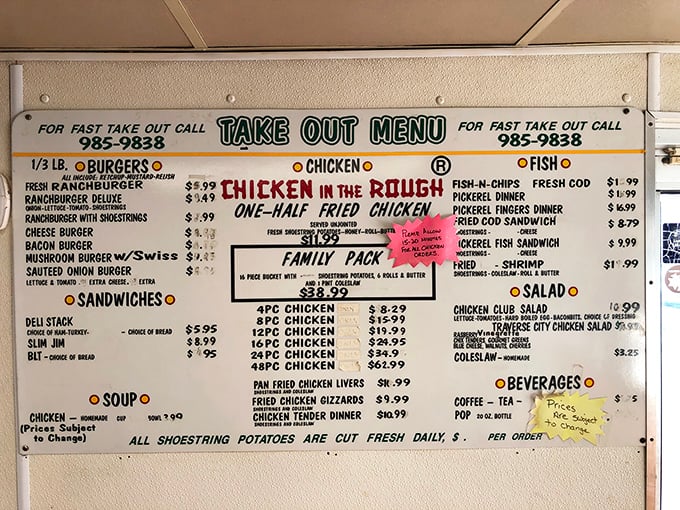 This menu board tells you everything you need to know—they're serious about chicken, and those "fresh cut daily" shoestring potatoes aren't just words.
