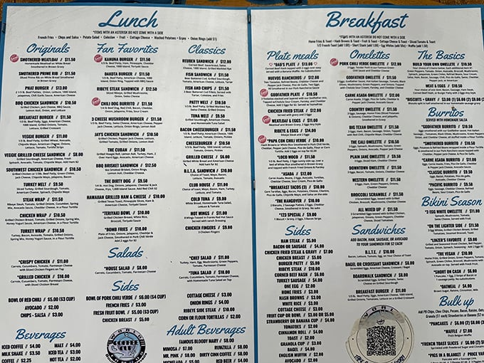 The menu – a roadmap to happiness. Study it carefully, though regulars already know their destination: pork chili verde omelet or huevos rancheros.
