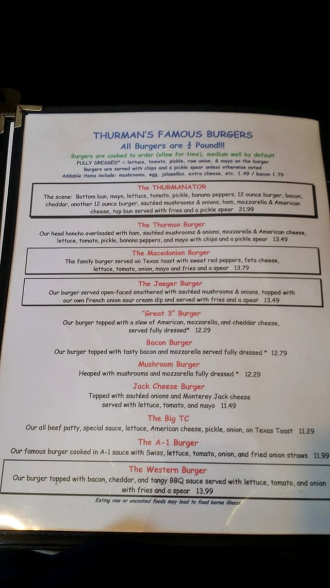 The menu reads like a love letter to excess. When they say "¾ pound," they're not kidding—these burgers require strategy and commitment.