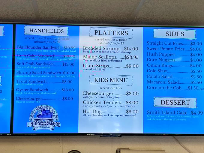 The menu board at Linton's reads like poetry to seafood lovers – a sonnet of handhelds, platters, and sides that promises maritime bliss.