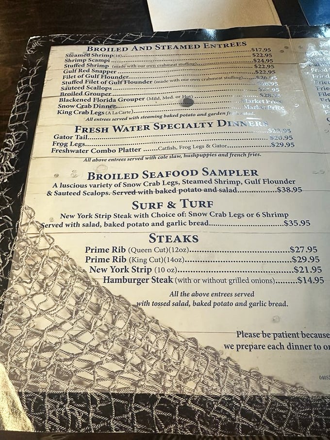 The menu tells the real story—a seafood lover's dream featuring everything from gator tail to snow crab legs.