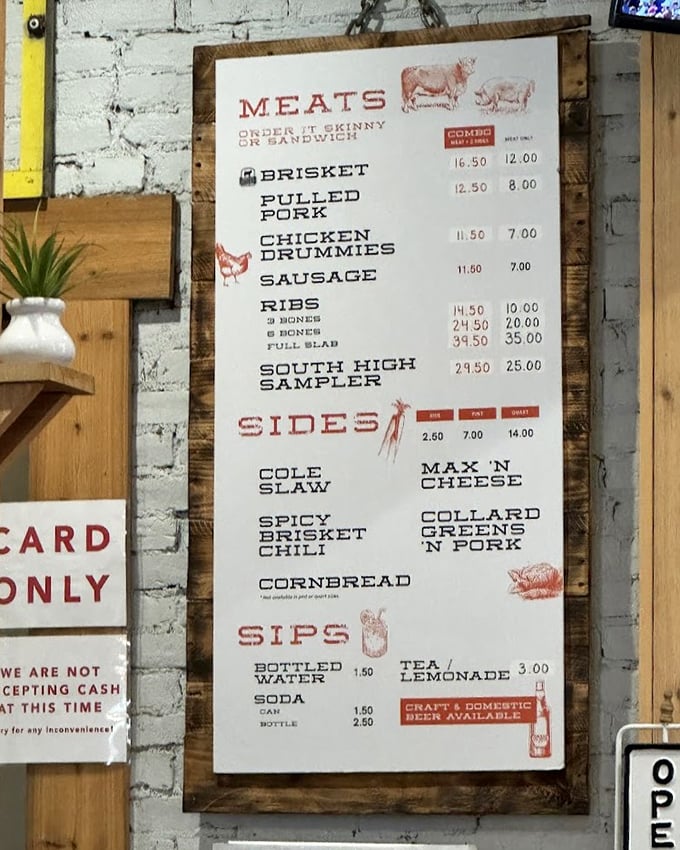The menu board speaks fluent barbecue – no translation needed when hunger is your native language.