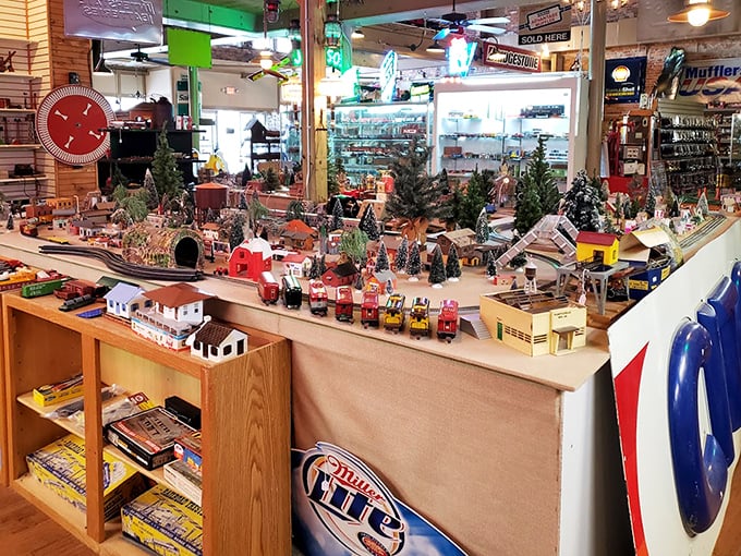 This miniature train display isn't just a model—it's an entire world waiting for you to imagine yourself aboard.