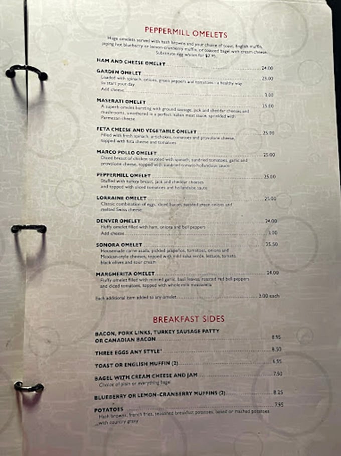 The menu reads like a love letter to breakfast classics, with omelets so stuffed they'd make a Vegas buffet blush with inadequacy.
