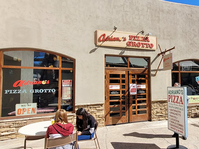 Adriano's Pizza Grotto offers that perfect shopping pit stop – where retail therapy meets carb therapy in delicious harmony.