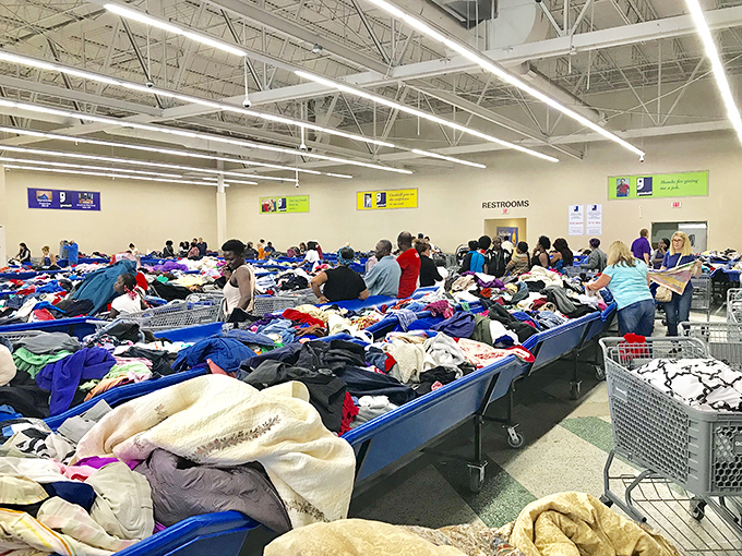 The "feeding frenzy" in action! Savvy shoppers navigate the sea of textiles with the focus of stock traders on Wall Street.