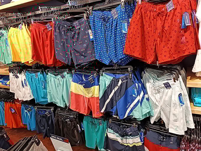 A rainbow of swim trunks stands ready for Florida adventures—because nothing says "vacation" quite like having too many options for beachwear.