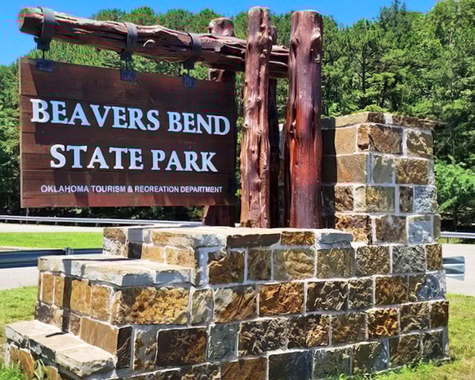 This rustic welcome sign isn't just wood and stone—it's the gateway to your next "why haven't we been here before?" adventure.