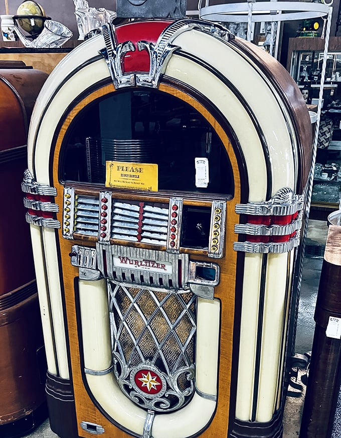 This Wurlitzer jukebox isn't just furniture—it's a time machine that transports you back to sock hops and first kisses with every glance.