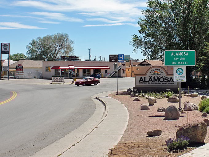Alamosa's main drag welcomes you with mountain views and the promise of affordable Rocky Mountain living.