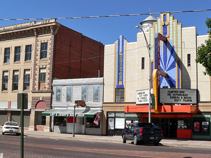 Classic theater marquees and vintage storefronts create a living museum of Main Street dreams.