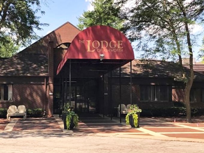 Brick elegance meets small-town hospitality in this inviting entrance that welcomes you like an old friend.