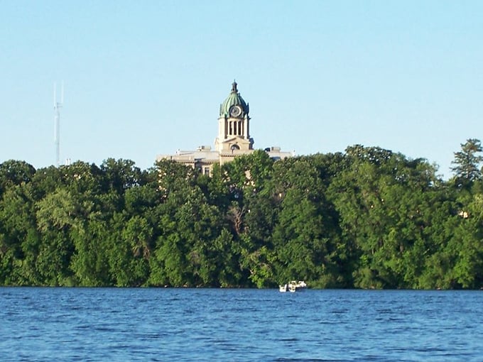 A historic courthouse crowns the hill overlooking blue waters, standing guard over this affordable lakeside paradise.