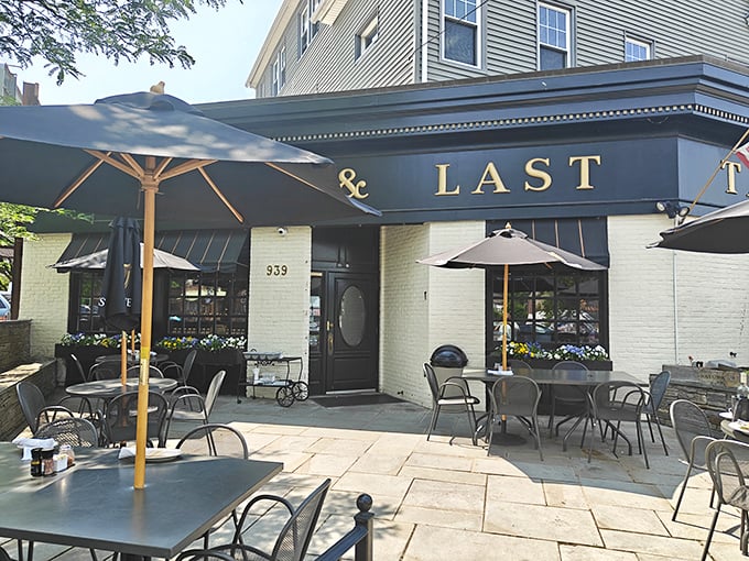 First & Last's outdoor patio beckons like a siren song for pizza lovers seeking their happy place.