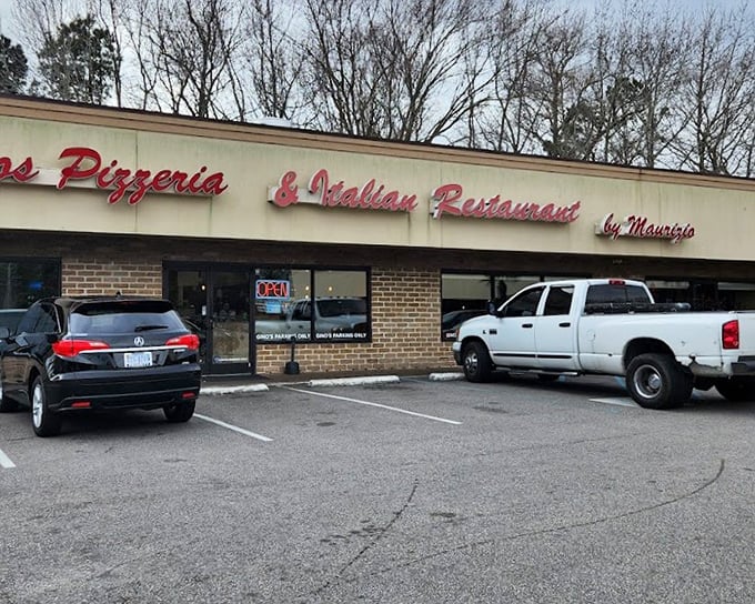 Gino's understated brick exterior hides pizza treasures within – like finding a Rolex in your grandfather's old fishing jacket.