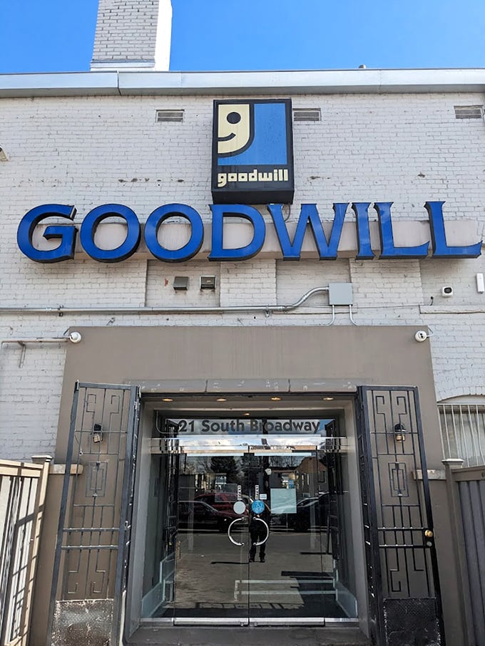 Goodwill's Broadway location stands tall like the Taj Mahal of thrifting—white brick, blue letters, endless possibilities.