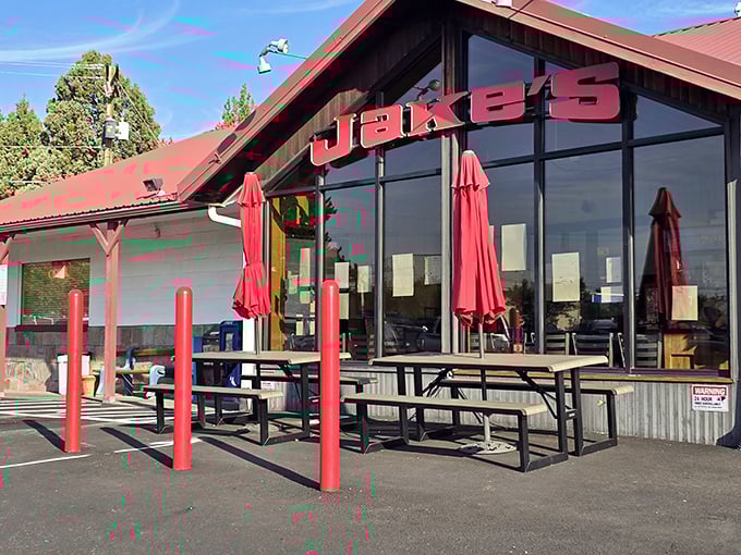 Jake's bold red roof and patio scream "stop here for comfort food!" Like a lighthouse for the hungry, guiding you to burger paradise.