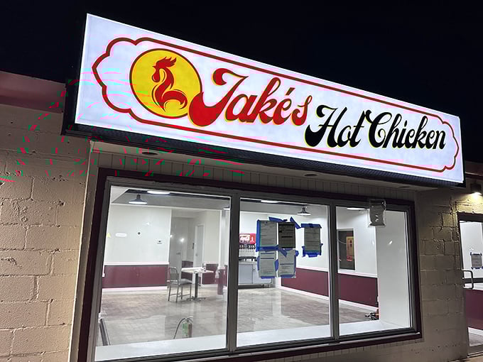 Jake's bold sign promises Nashville heat with Arkansas hospitality – a spicy marriage made in chicken heaven.