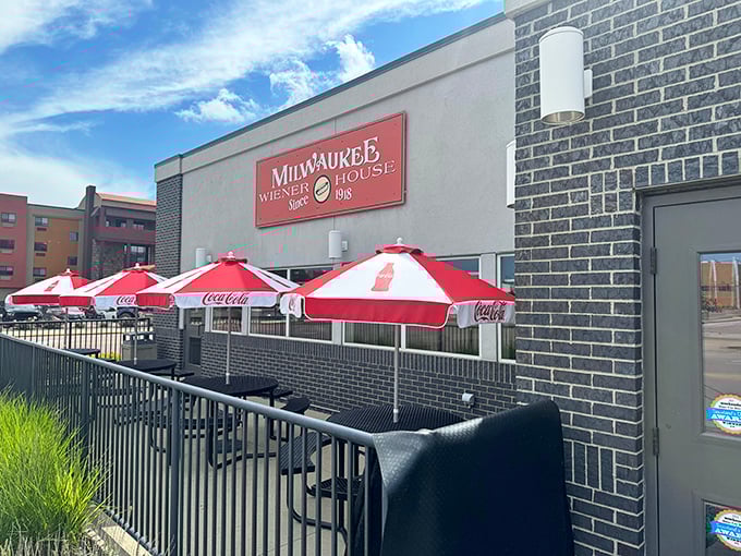 Those red and white umbrellas are like beacons guiding hungry souls to hot dog heaven.