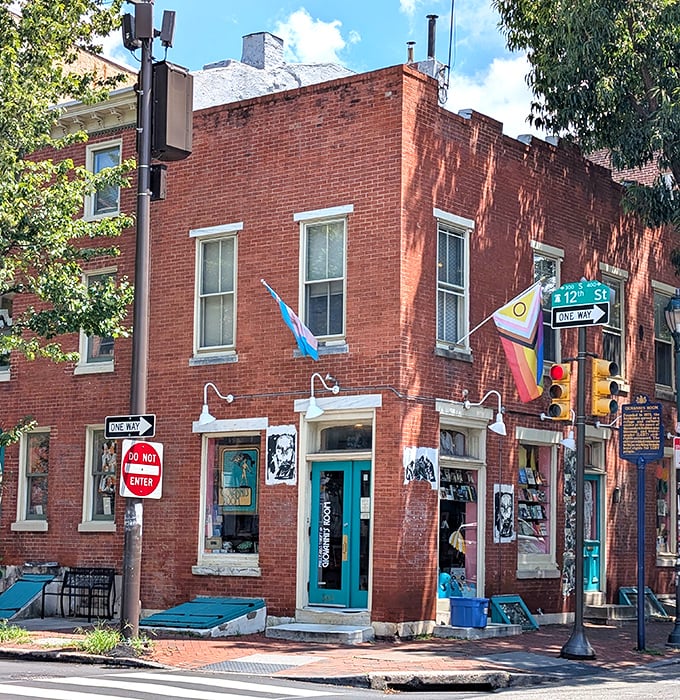 Giovanni's Room exterior: "Literary treasures behind turquoise doors. This historic corner shop has stories to tell beyond what's on its shelves."