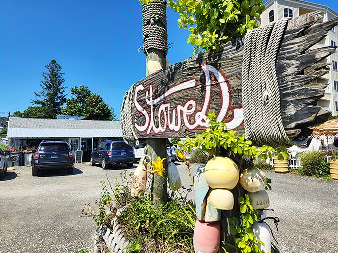 That hand-painted "Stowe's" sign might as well read "Seafood Nirvana." Those colorful buoys aren't just decoration—they're promises.