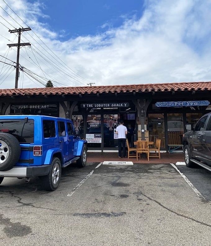 The Lobster Shack hides in plain sight among other shops. Don't let the modest exterior fool you—lobster gold awaits inside!