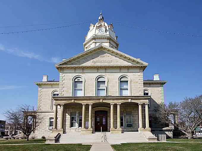 Winterset's historic courthouse stands as a testament to small-town grandeur, with classic limestone architecture that's stood the test of time.