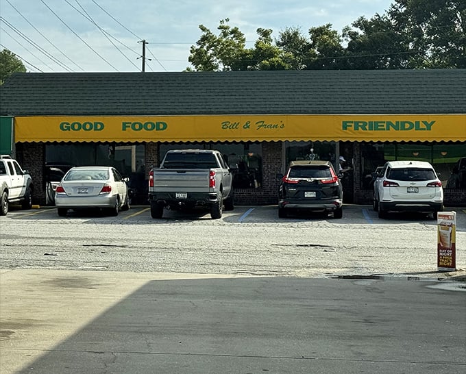 Cars lined up like hungry guests at a family reunion—Bill & Fran's parking lot tells the whole delicious story.