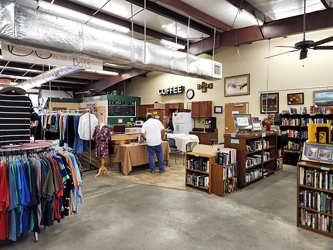 Coffee brewing, books waiting, and treasures hiding—this interior proves thrift shopping evolved into something wonderfully civilized.