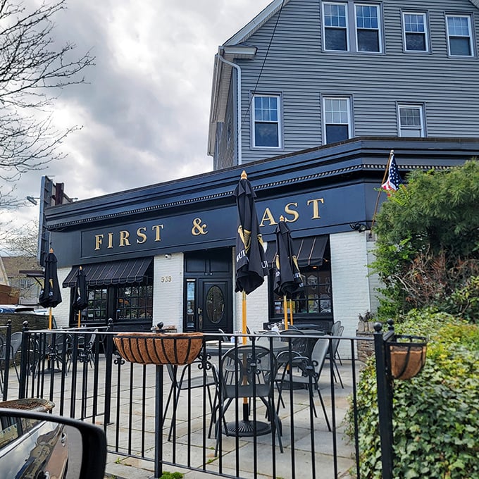 That sleek black exterior holds Hartford's worst-kept secret – some of the city's finest brick oven magic.