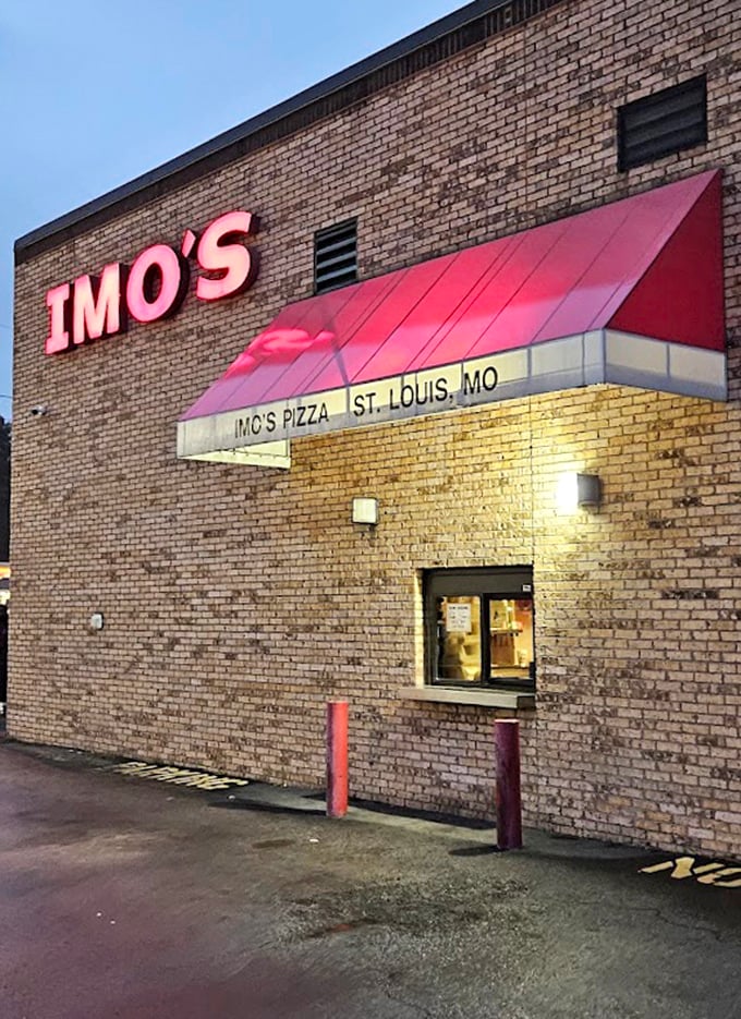 That red-and-pink awning combo says "we've been feeding families since before you were born."