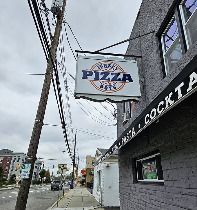 Morning light reveals Jersey Pizza Boys' no-frills exterior – proof that the best pizza joints focus on what's in the oven, not on the walls.