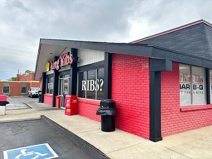 The bright red exterior isn't subtle, but neither is the flavor inside – King Ribs rules its BBQ kingdom with smoky authority.