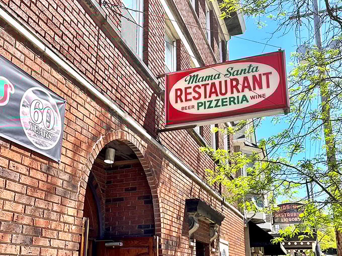 The vintage sign of Mama Santa’s Pizzeria has been a Little Italy landmark for decades, inviting locals and visitors alike to taste a slice of Cleveland tradition.
