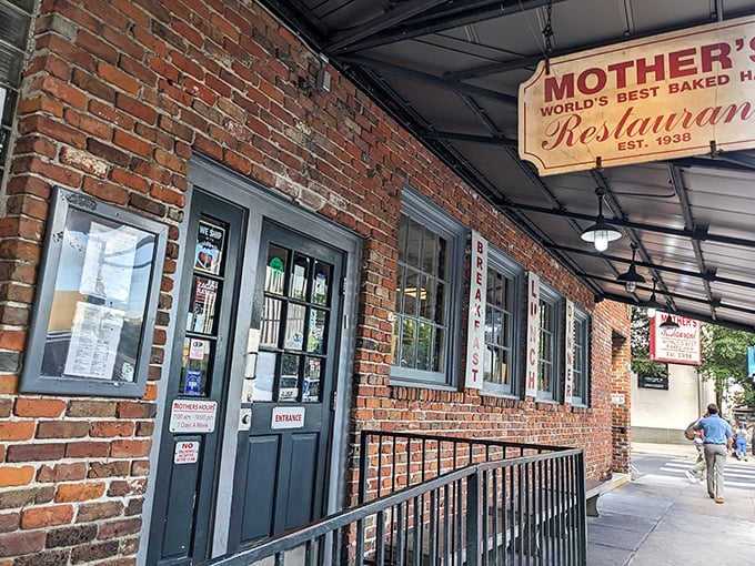 That weathered brick facade is just the appetizer—Mother's Restaurant serves New Orleans history with a side of the best biscuits in town.