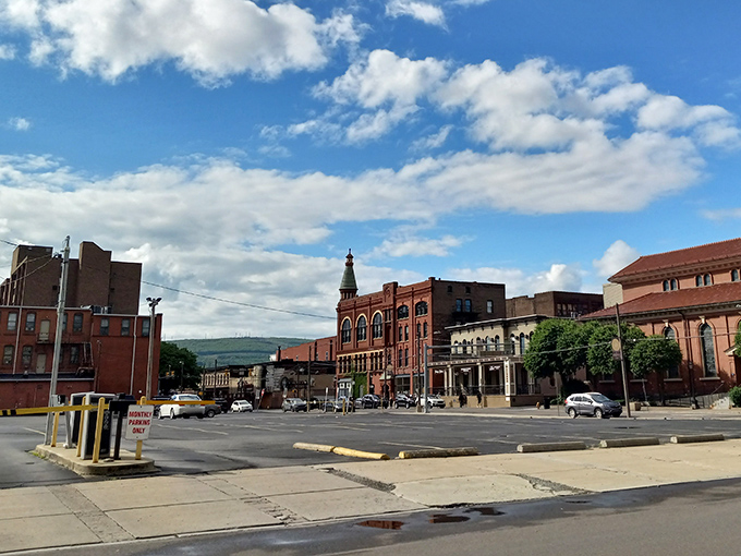 Downtown buildings stand shoulder-to-shoulder like old friends catching up over morning coffee.
