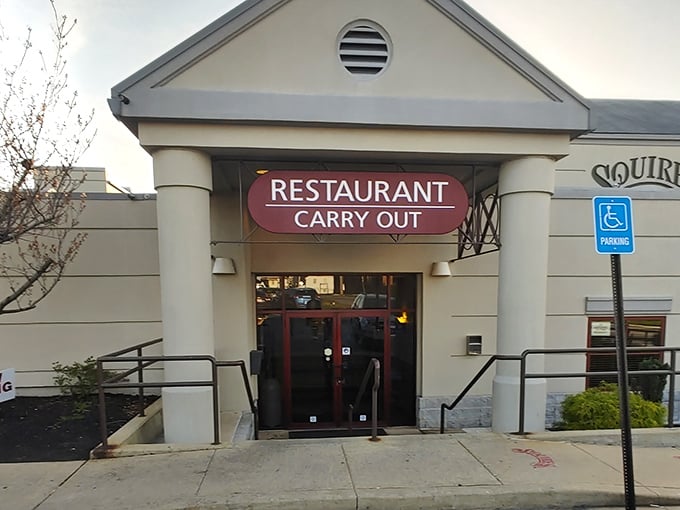 The unassuming entrance to Squire's - where Maryland pizza legends are born and appetites are conquered.