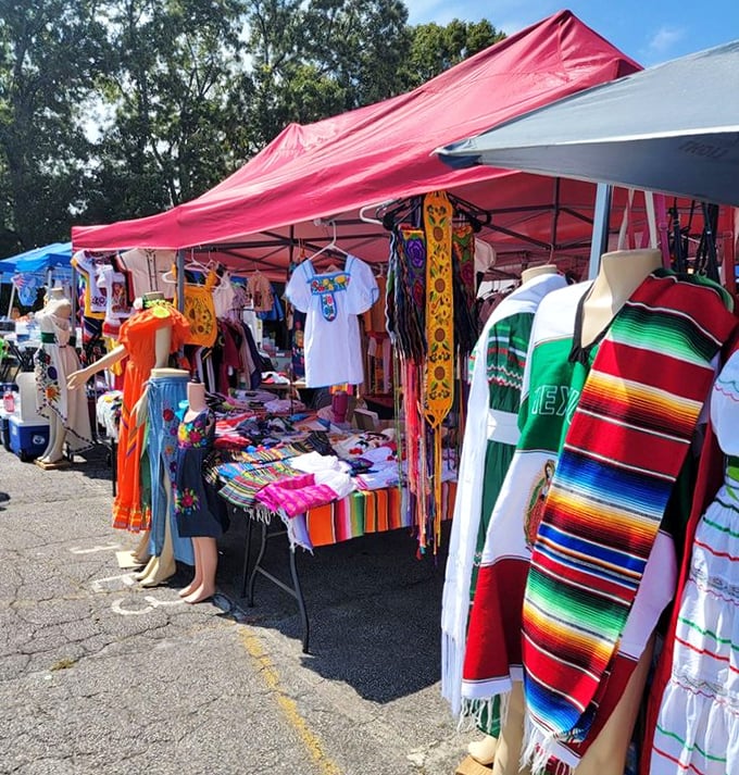 Colorful tents line the parking lot, offering vibrant Mexican blankets and clothing that add a splash of culture.
