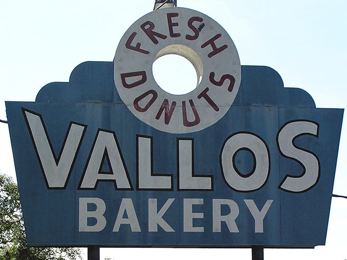 The "Fresh Donuts" sign isn't just advertising—it's practically a beacon calling all sugar lovers home.