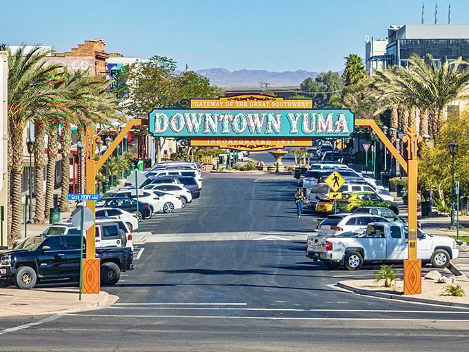 Yuma's iconic gateway arch announces your arrival to the sunniest city in the world, where palm trees stand like exclamation points against the blue sky.