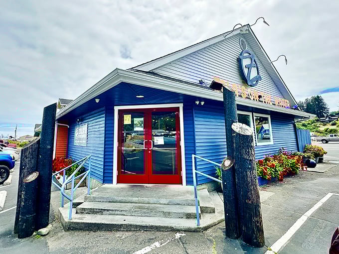 Those weathered posts frame more than a doorway – they're the gateway to seafood pizza paradise.