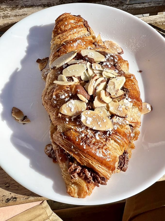This almond croissant isn't just breakfast—it's edible architecture. Flaky layers shatter delicately, revealing an almond filling that would make Parisians nod in approval.