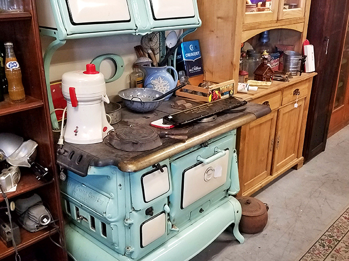 That vintage turquoise stove isn't just kitchen equipment—it's a time machine to grandma's Sunday dinners and simpler times.