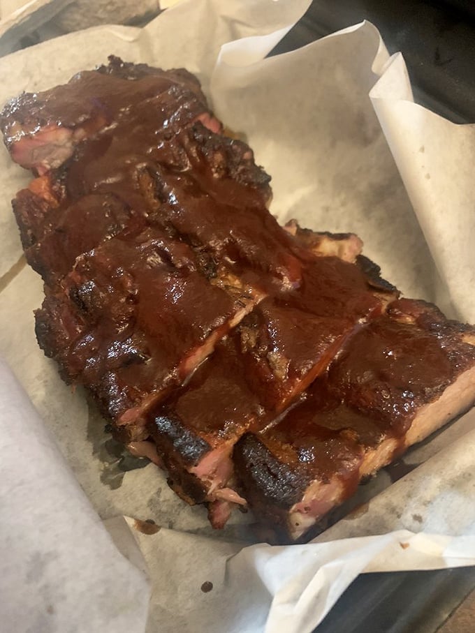 Ribs so tender they're practically falling off the bone before you even pick them up – barbecue perfection achieved.