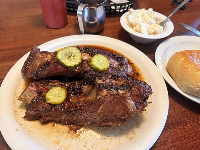 Behold the star attraction! These ribs don't just fall off the bone—they practically leap into your mouth with smoky enthusiasm.