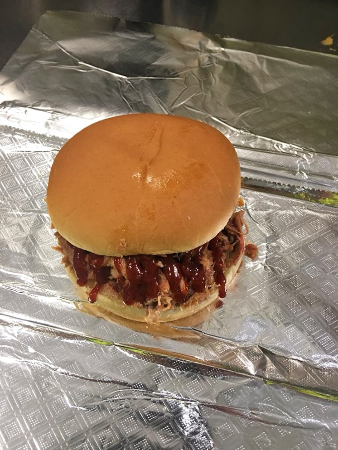 The BBQ sandwich – where smoke-kissed pork meets a soft bun in a relationship so perfect it should have its own country song.