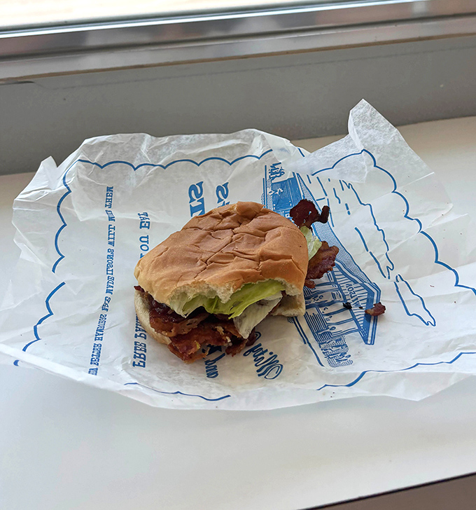 The star of the show – Wilson's legendary BLT, where three humble ingredients achieve sandwich immortality through perfect execution.