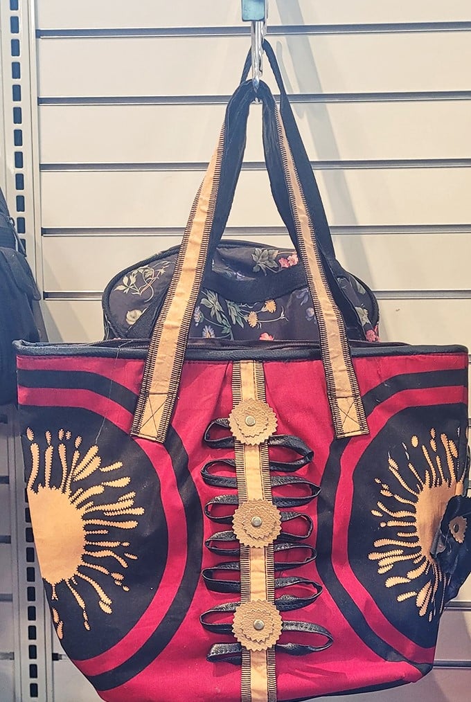 This isn't just a handbag—it's wearable folk art with personality. The bold red and intricate detailing would cost a fortune at a boutique.