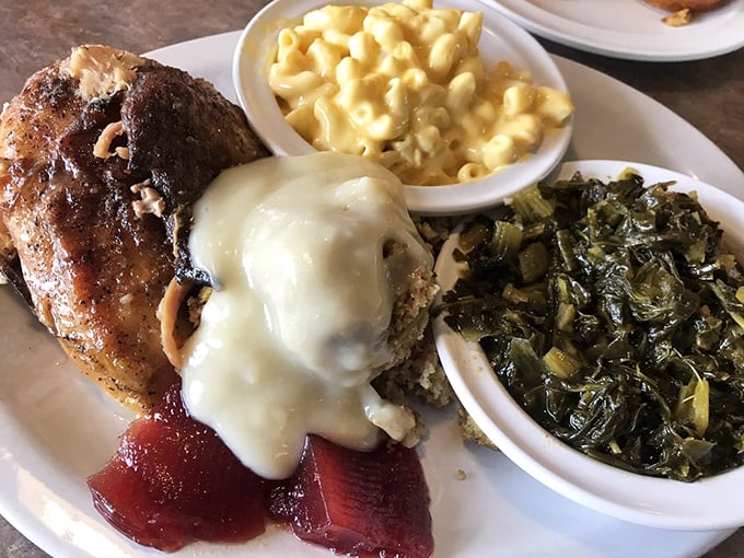 Behold the star attraction: baked chicken so tender it practically confesses its deliciousness under the gentle interrogation of your fork.